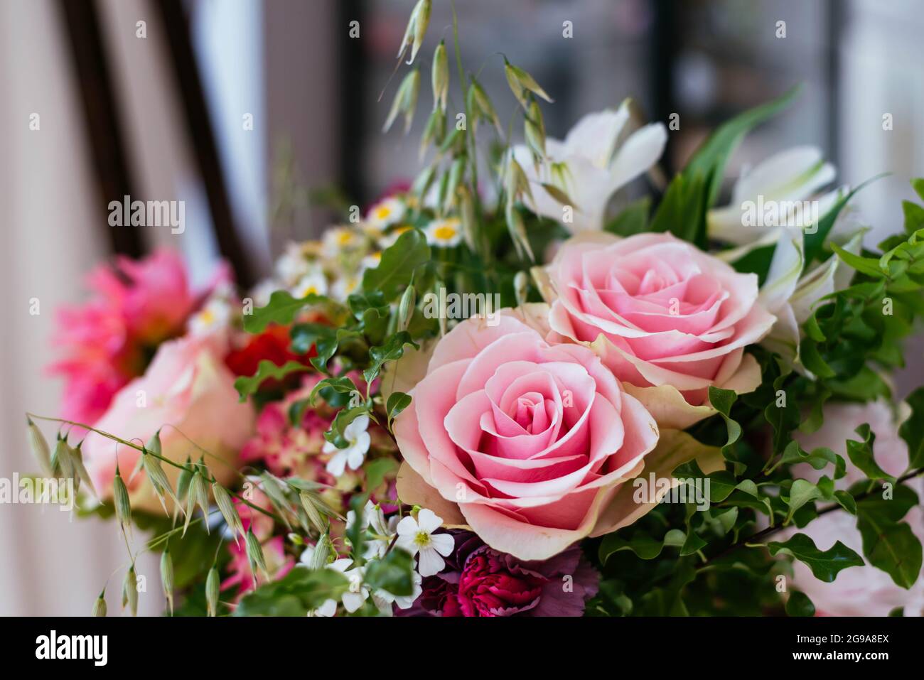 Spring flowers bouquet with pink roses Stock Photo - Alamy