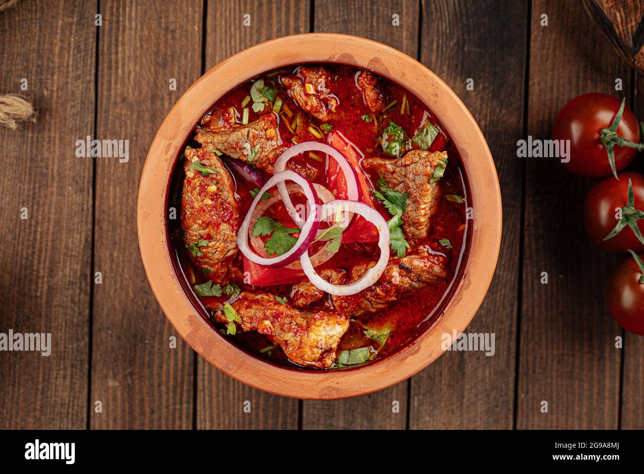 Georgian dish chakhokhbili stewed chicken Stock Photo - Alamy