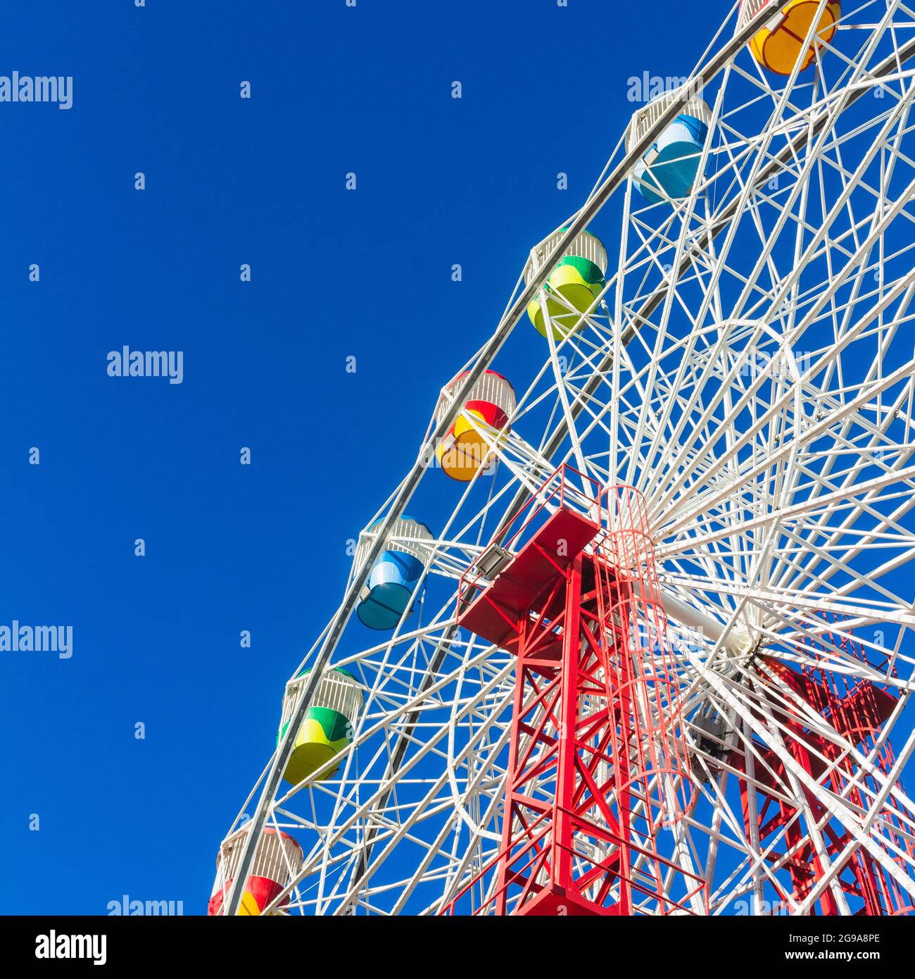 A Colourful ferris wheel carriages at an amusement park Sydney ...