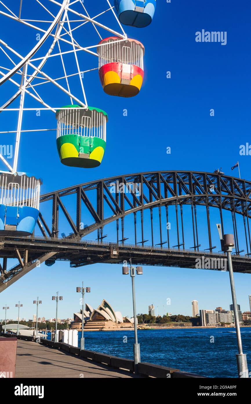 A Colourful ferris wheel carriages at an amusement park Sydney ...