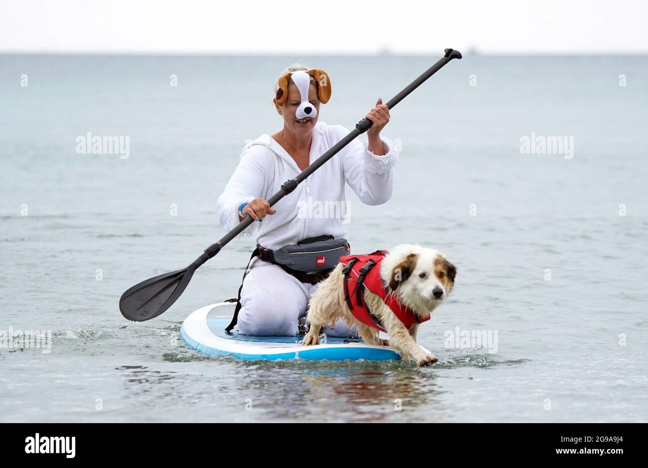 Liz Wilkinson and her dog Diogie, a Sprollie cross, take part in ...
