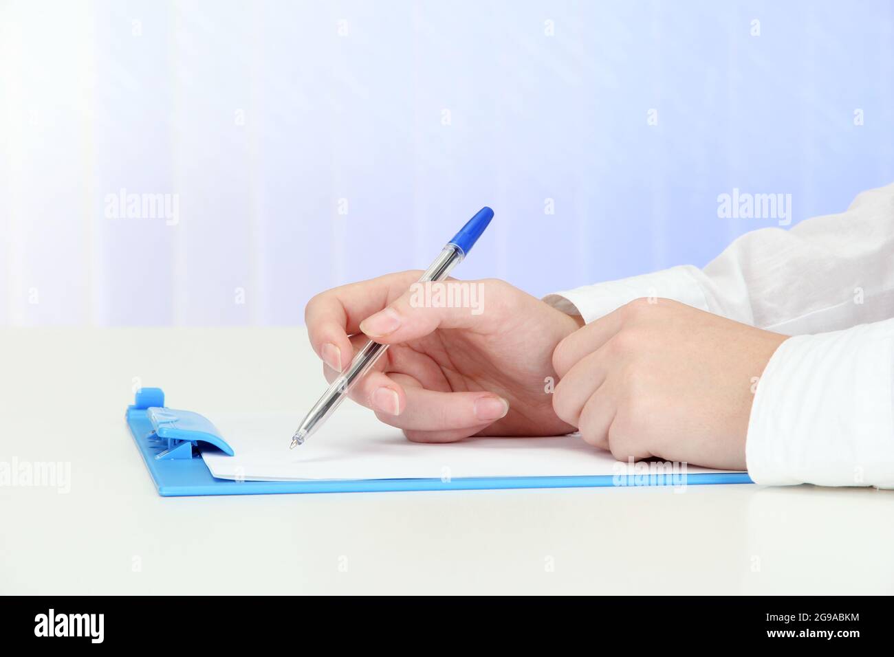 Closeup of businesswoman hands, writing on paper Stock Photo - Alamy