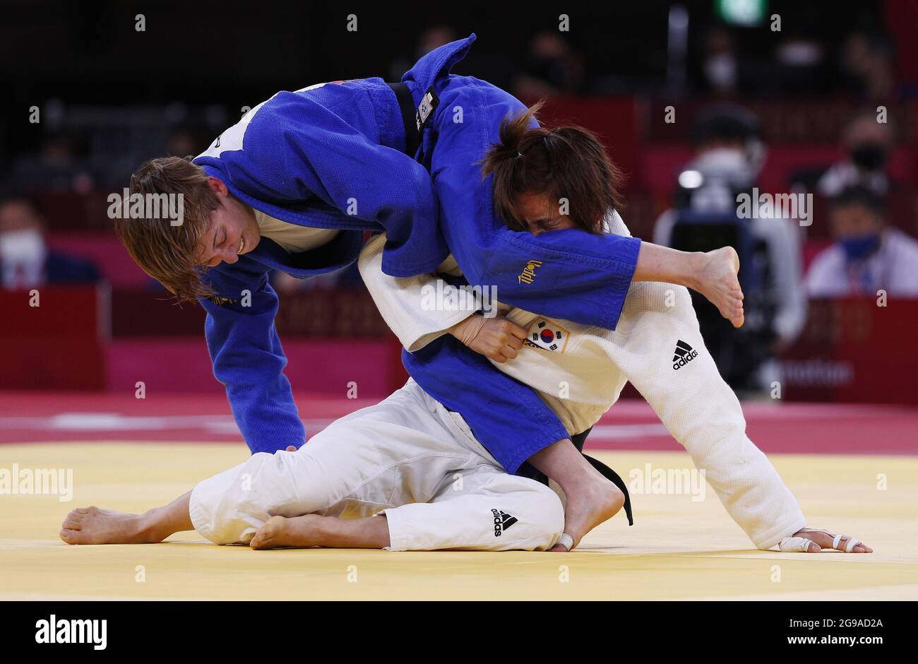Korea's Da-Sol Park (white) competes against Hungary's Reka Pupp in a ...