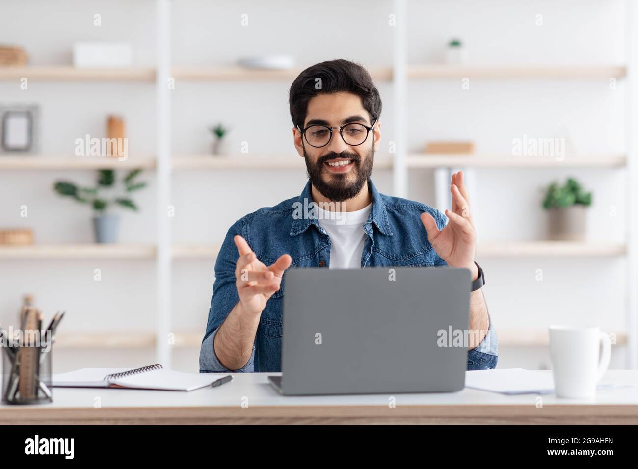 Friendly male teacher explaining lesson hi-res stock photography and ...