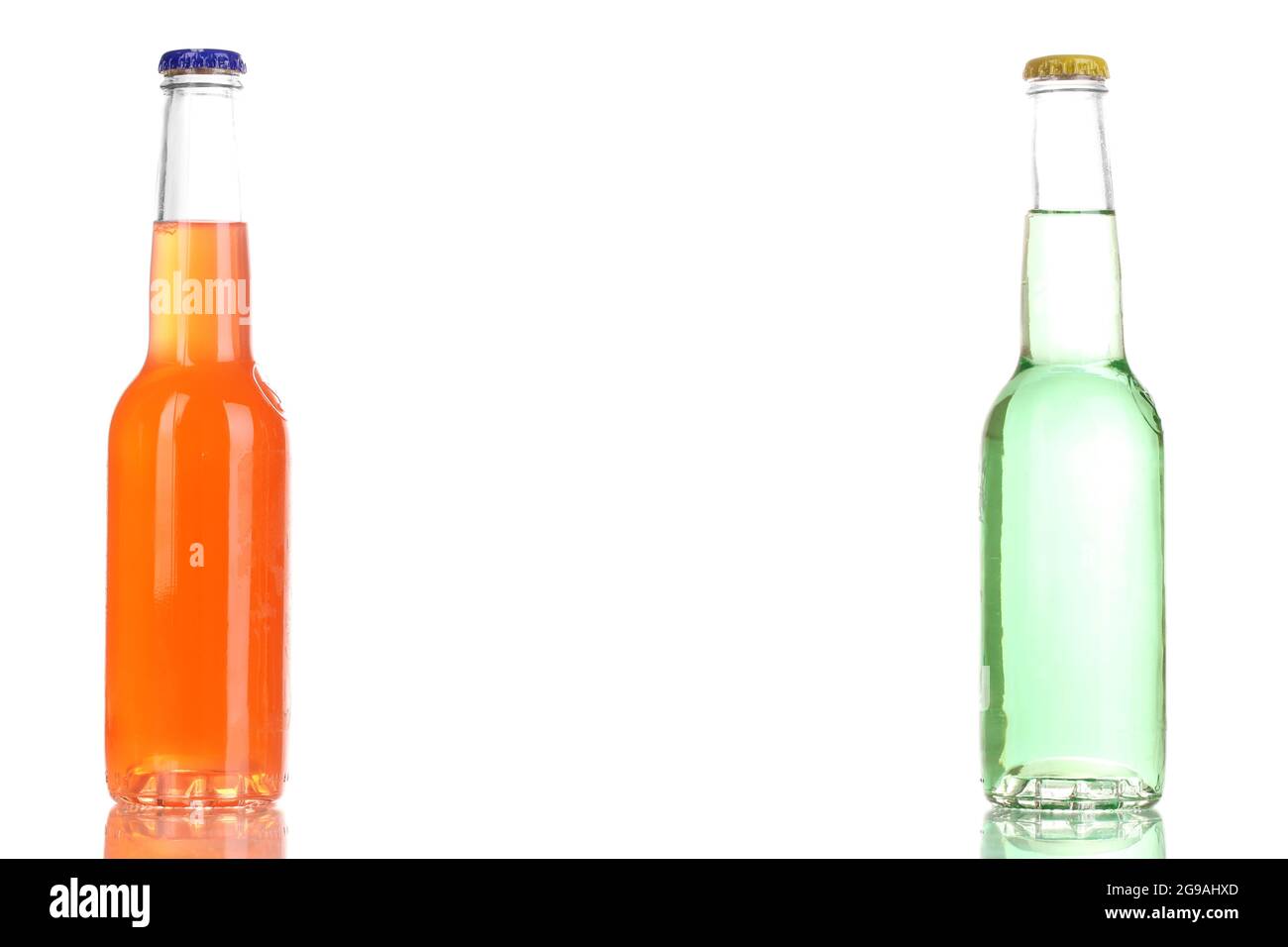 Tasty drinks in bottles isolated on white Stock Photo - Alamy