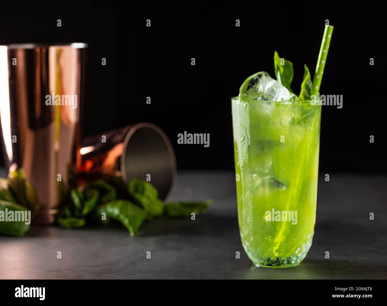 refreshing and light basil summer cocktail with ice cubes Stock Photo ...