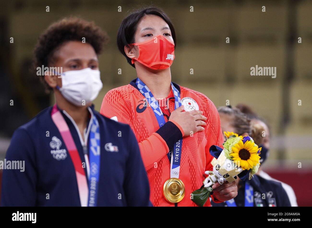 Tokyo, Japan. 25th July, 2021. Gold medalist Uta Abe from Japan listens ...