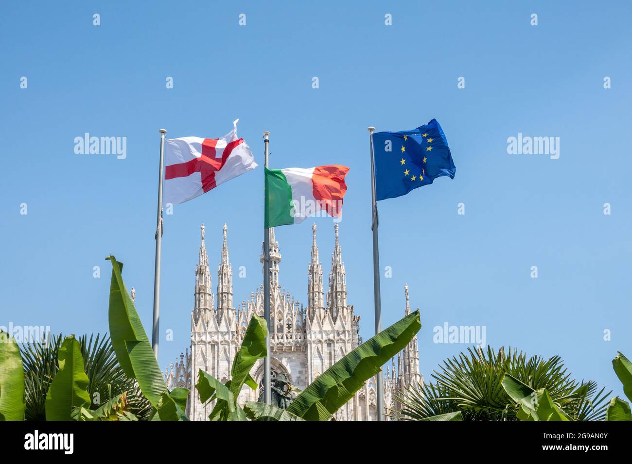 in front of the Milan Cathedral the Italian, English and European flags ...
