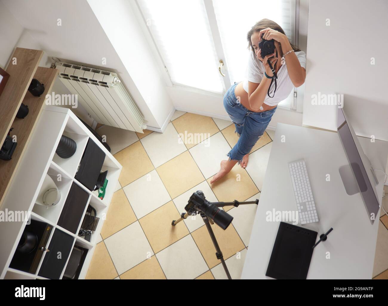 Professional photographer working hi-res stock photography and images ...