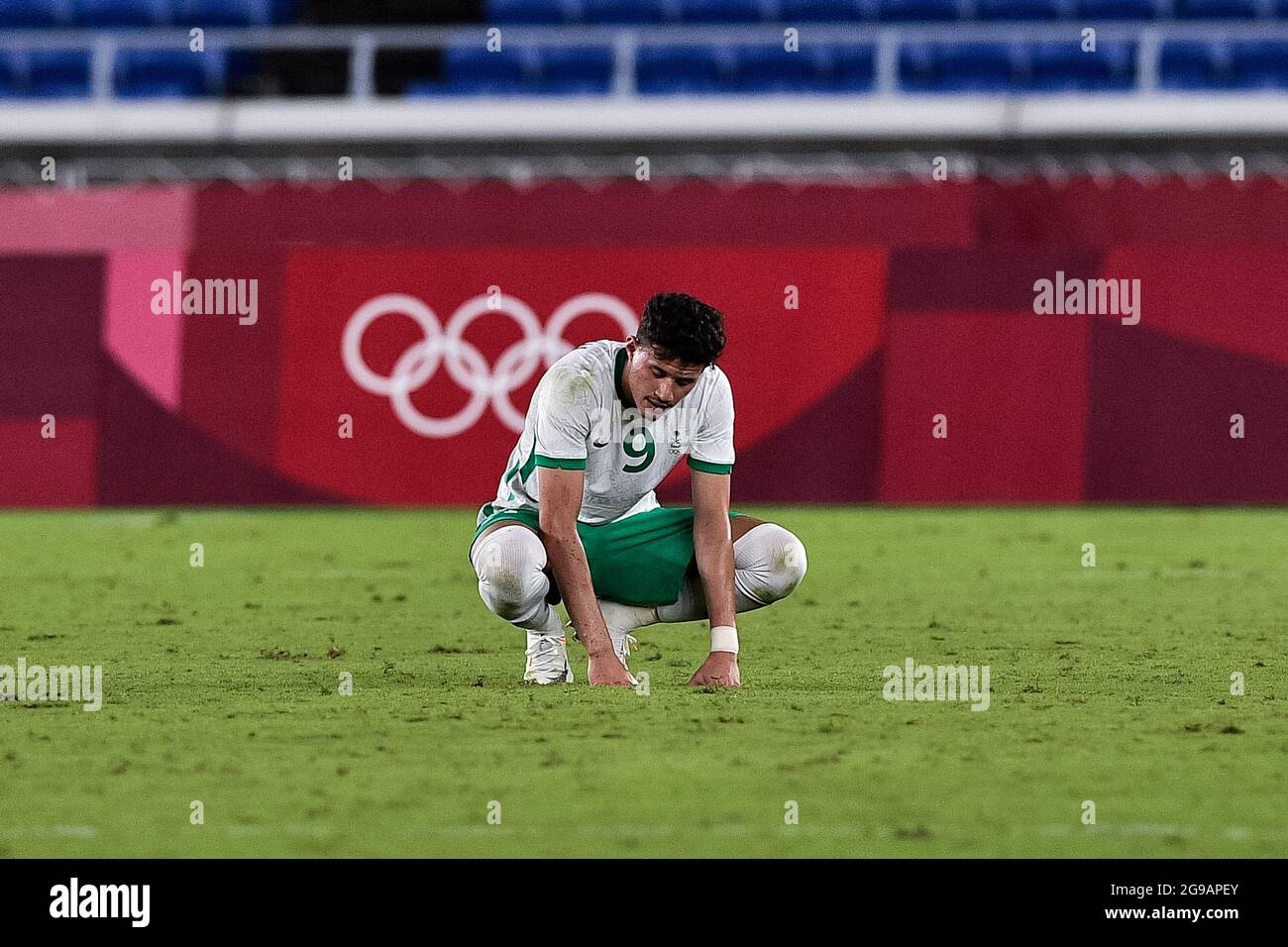 YOKOHAMA, JAPAN - JULY 25: Abdullah Al Hamdan looks dejected during the ...
