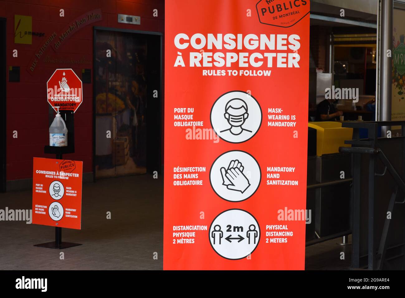 Signboard in big french characters and small English ones (law 101 ...