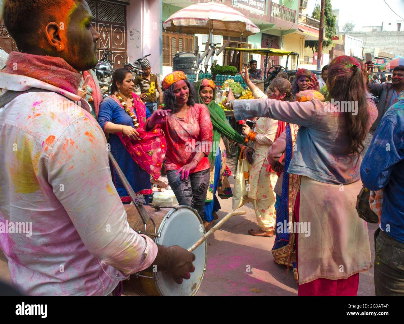 People are dancing to celebrate the color festival in India Stock Photo ...