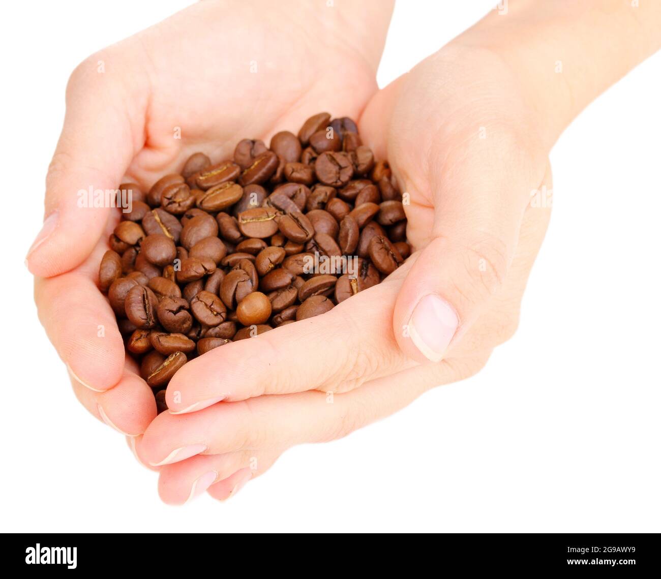 Coffee beans in hands isolated on white Stock Photo - Alamy