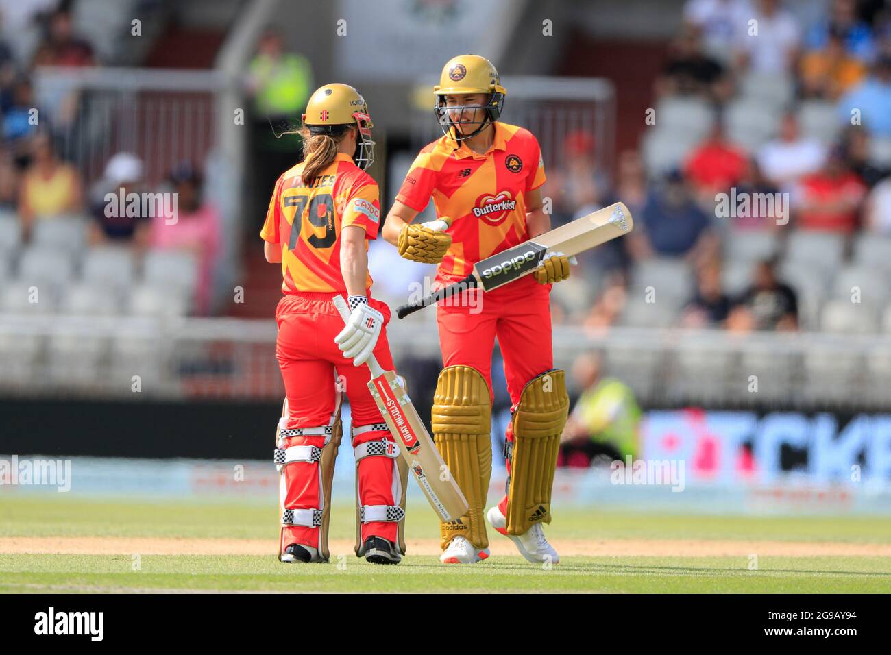 Isabelle Wong and Gwen Davies of Birmingham Phoenix have a mid wicket ...