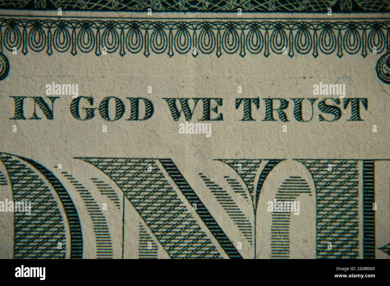 In God We Trust inscription on a dollar bill, macro Stock Photo - Alamy