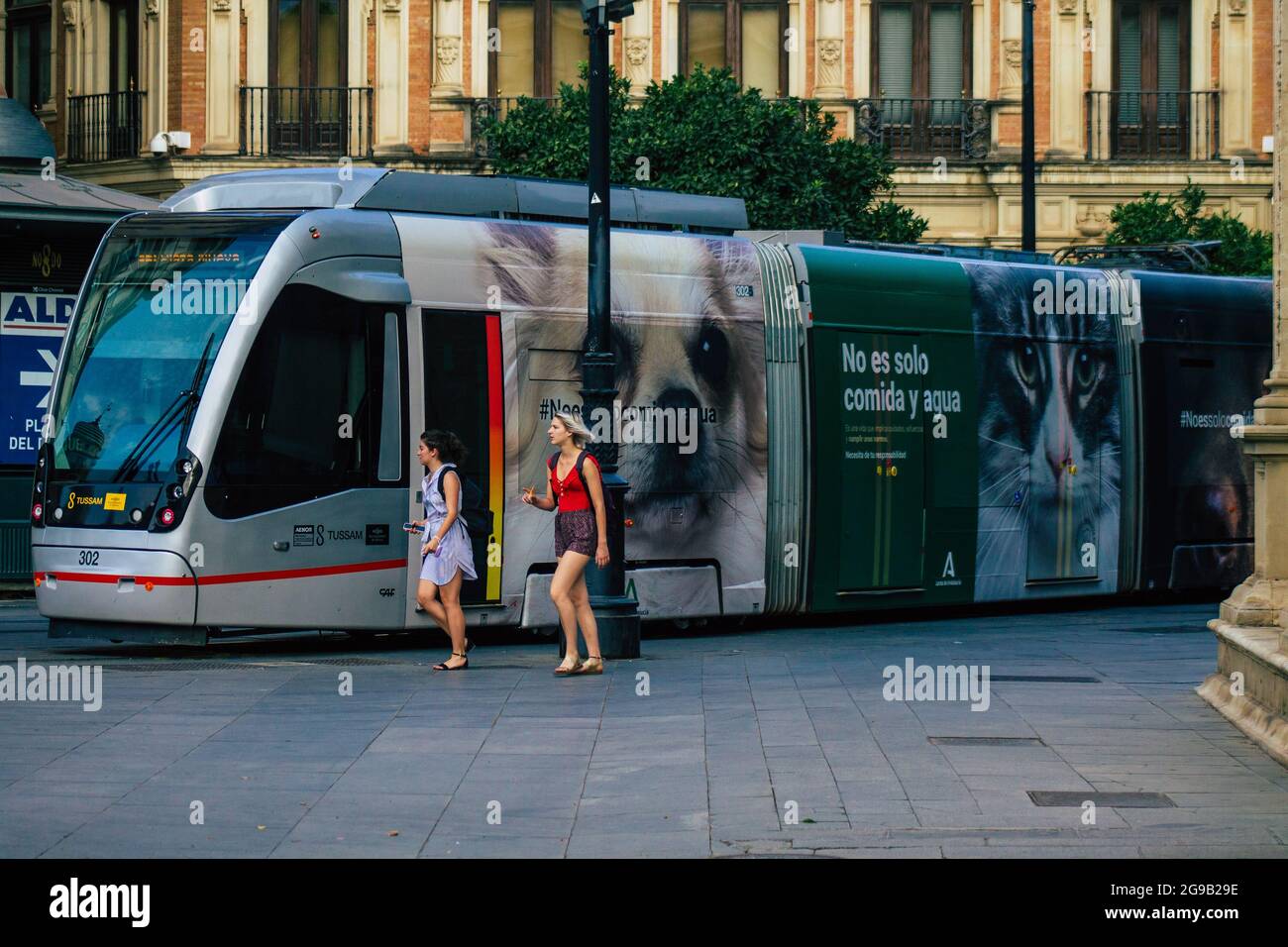 Seville Spain July 23, 2021 Modern electric tram for passengers rolling ...