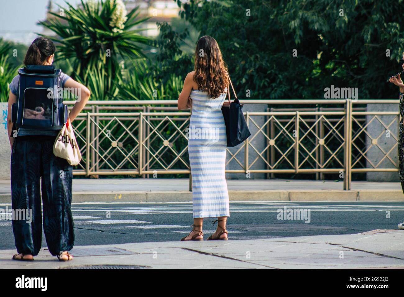 Seville Spain July 23, 2021 Pedestrians walking in the street of ...