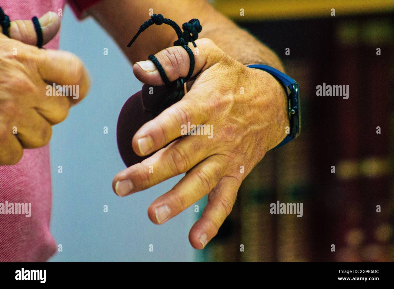 Seville Spain July 23, 2021 Closeup of the hands of castanets players ...