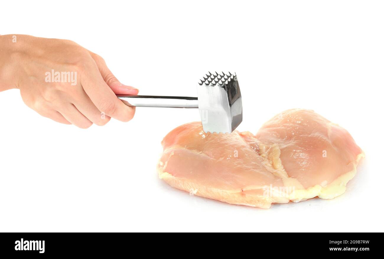 woman's hand beats chicken on white background close-up Stock Photo - Alamy