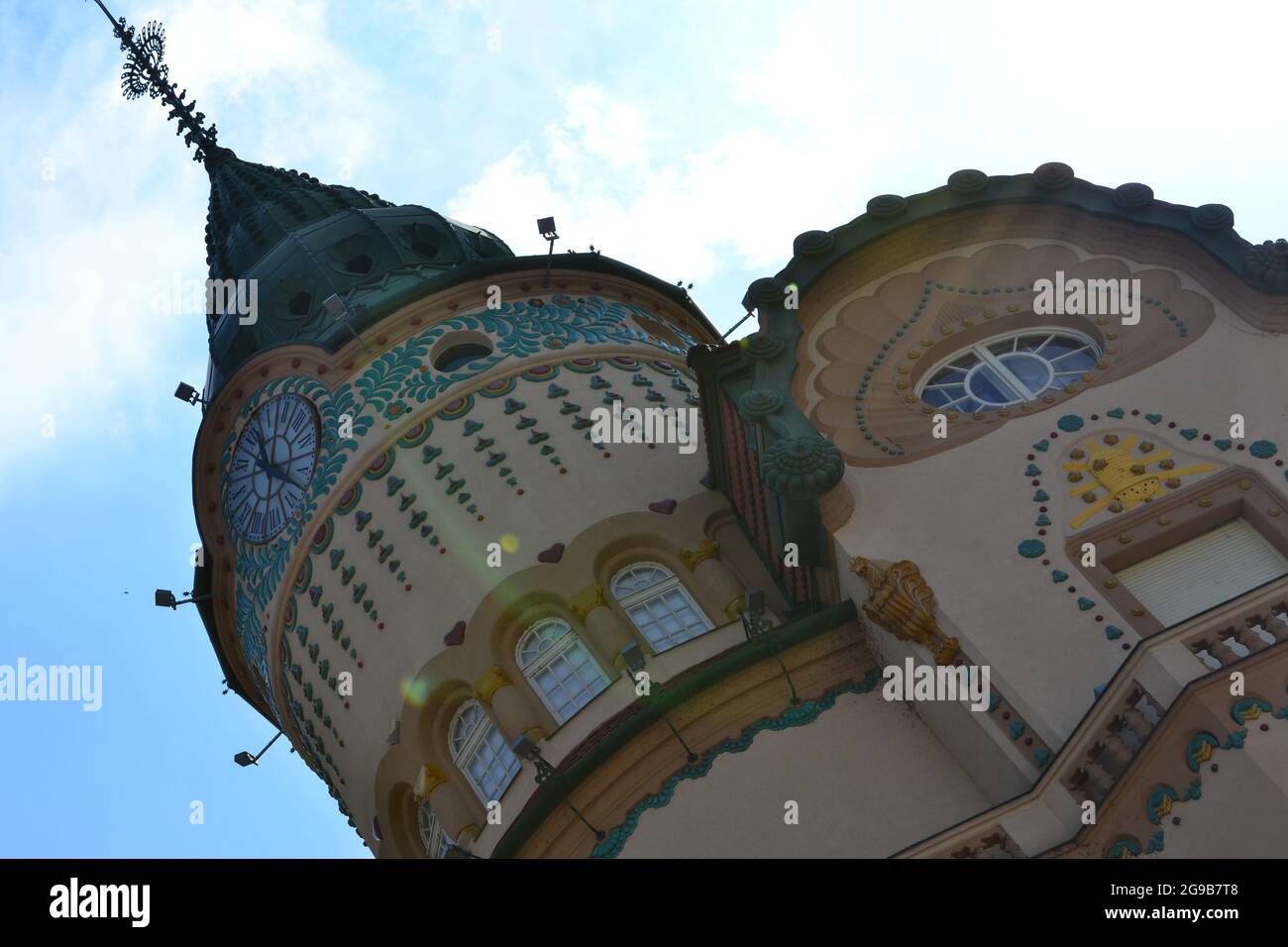 Clock tower vintage old building in historical city center Stock Photo ...