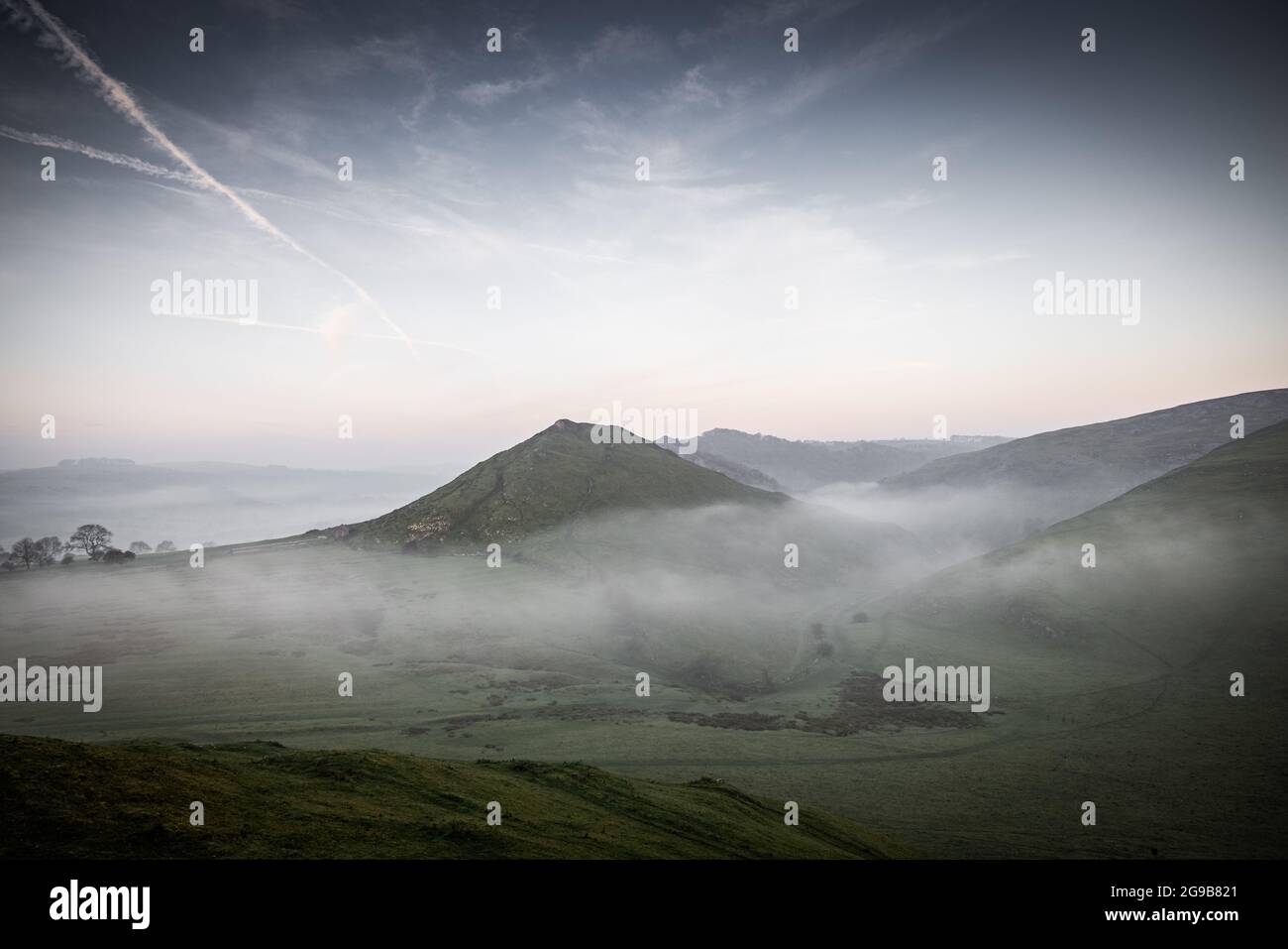 Thorpe Cloud, Derbyshire, Peak District on a misty Autumn morning. The ...