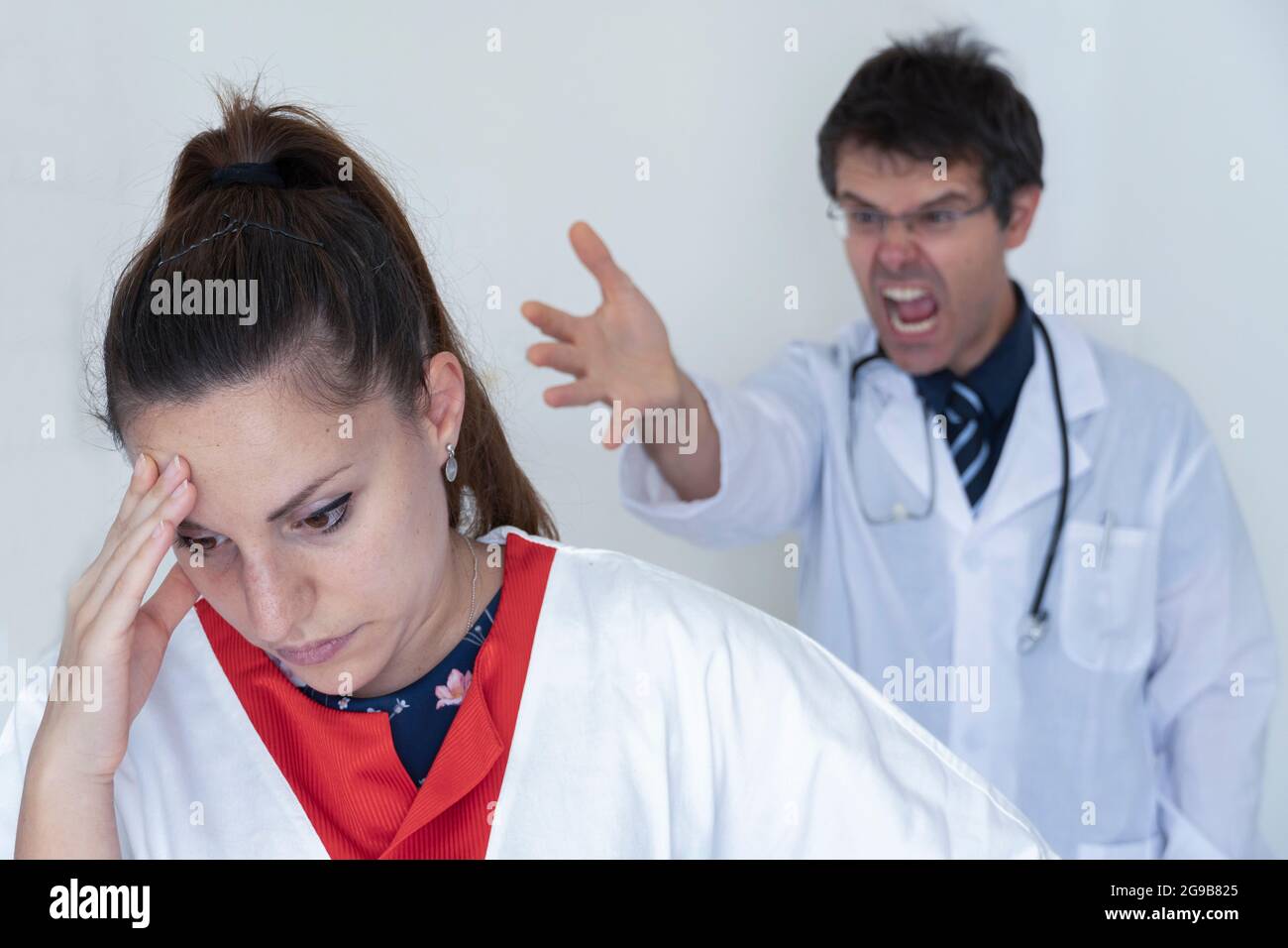 Doctor screams and yells at the poor scared and disconsolate nurse ...