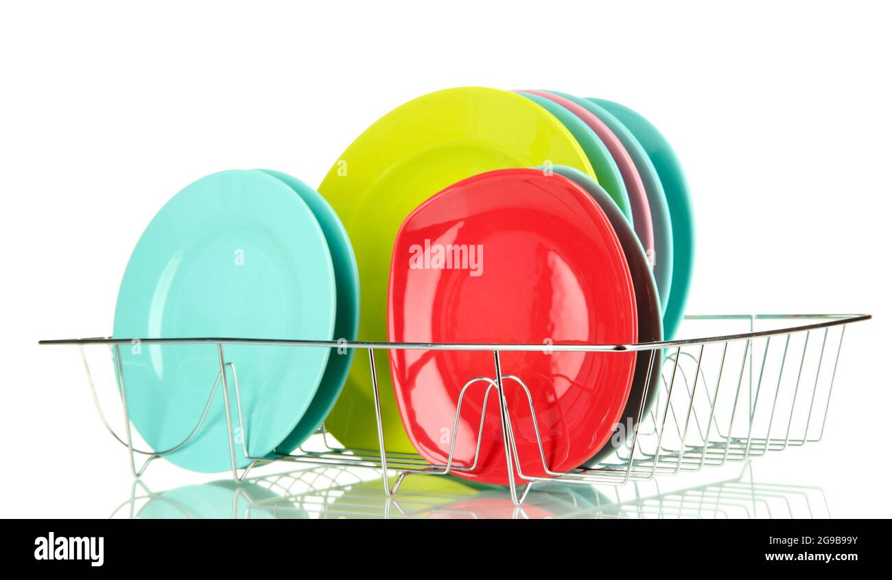 Color plates in rack isolated on white Stock Photo - Alamy