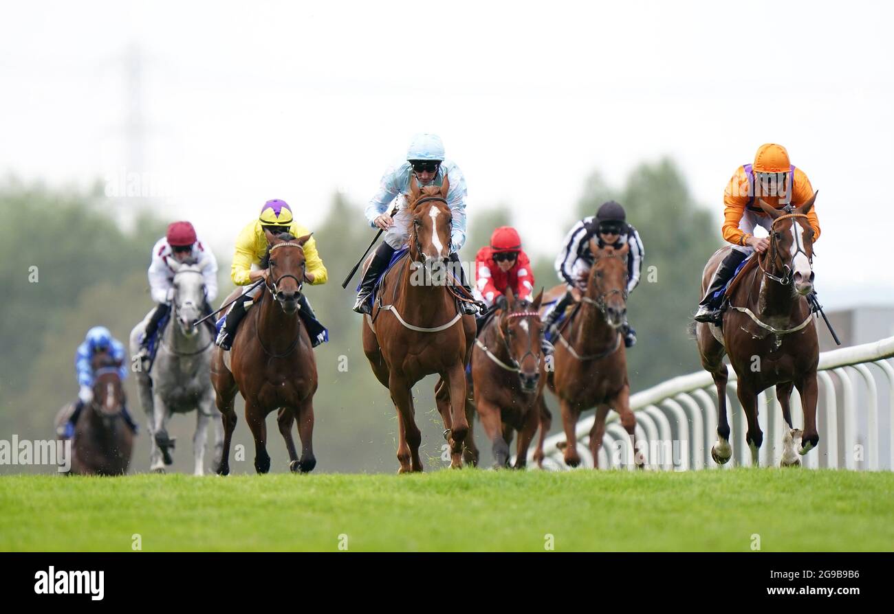 Alpha Cru and Daniel Tudhope (centre, blue) coming home to win the ...