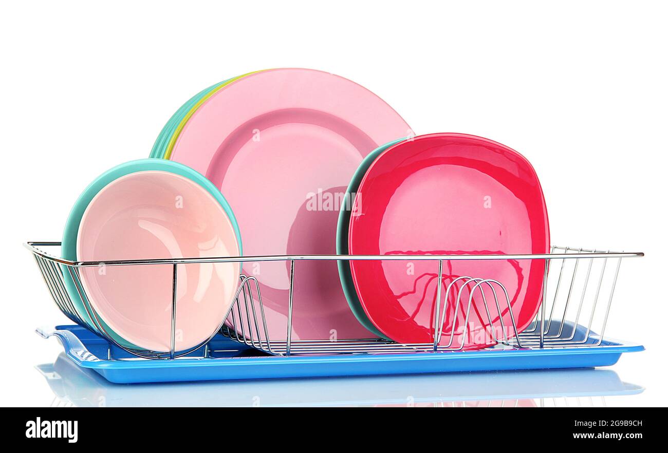 Color plates in rack isolated on white Stock Photo - Alamy