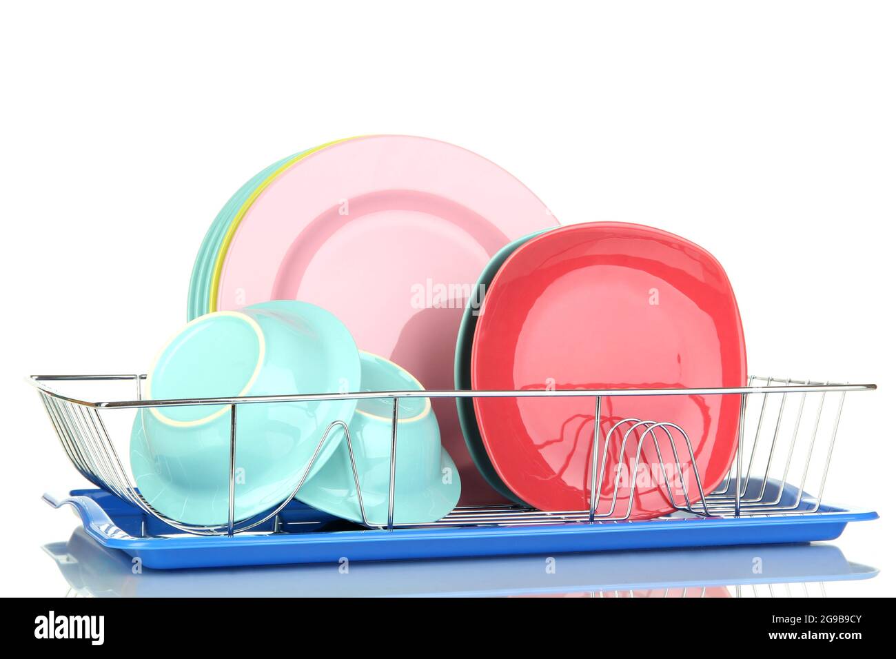 Color plates in rack isolated on white Stock Photo - Alamy