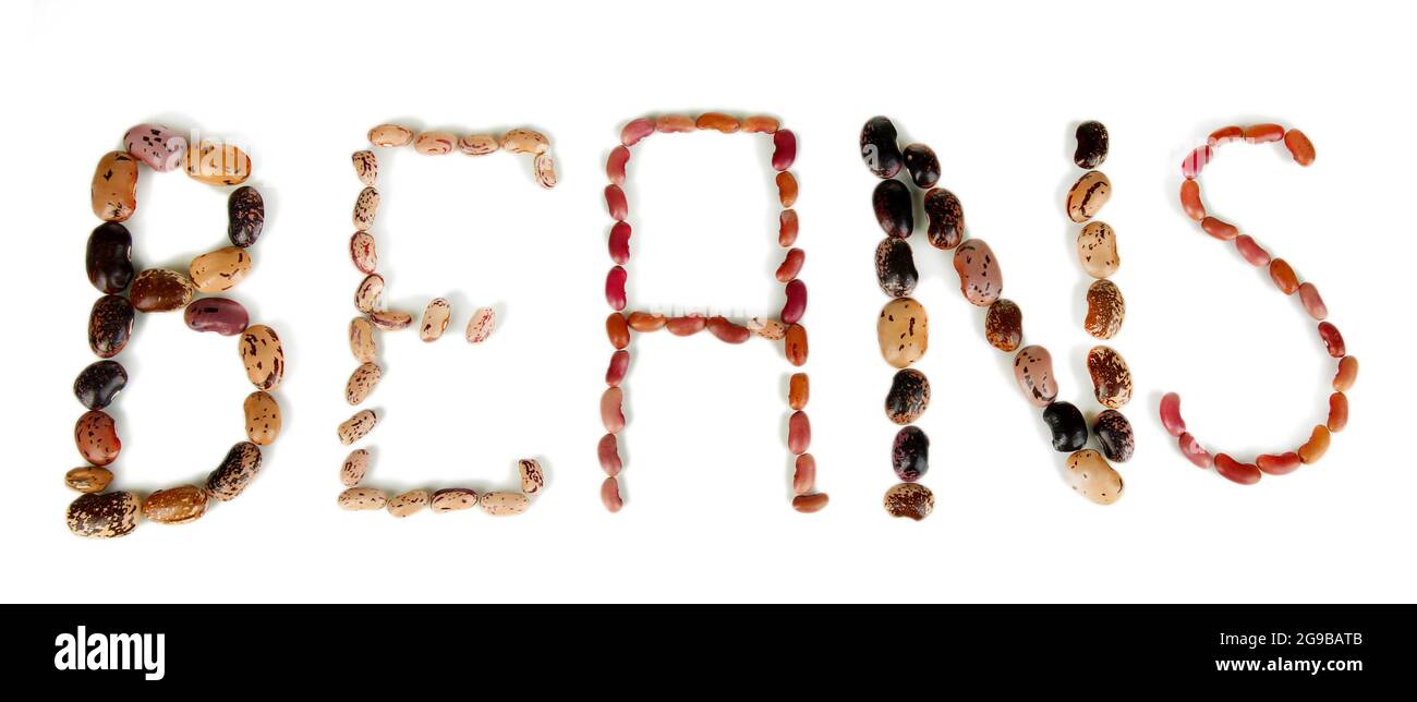 The word Beans is lined by different types of beans isolated on white ...