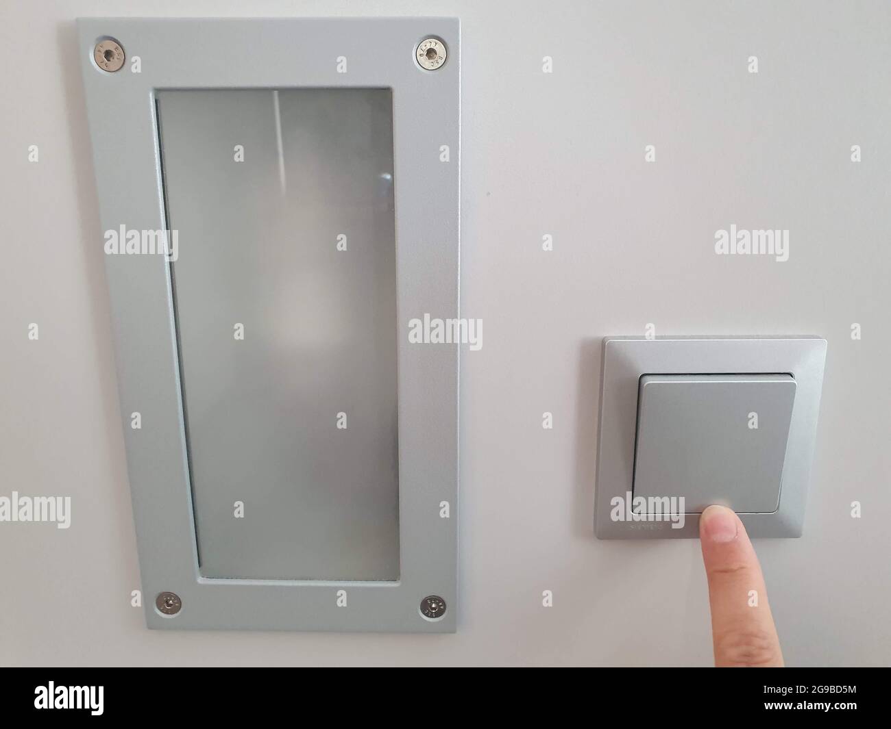 Switch the design lamp on and off with a switch Stock Photo - Alamy