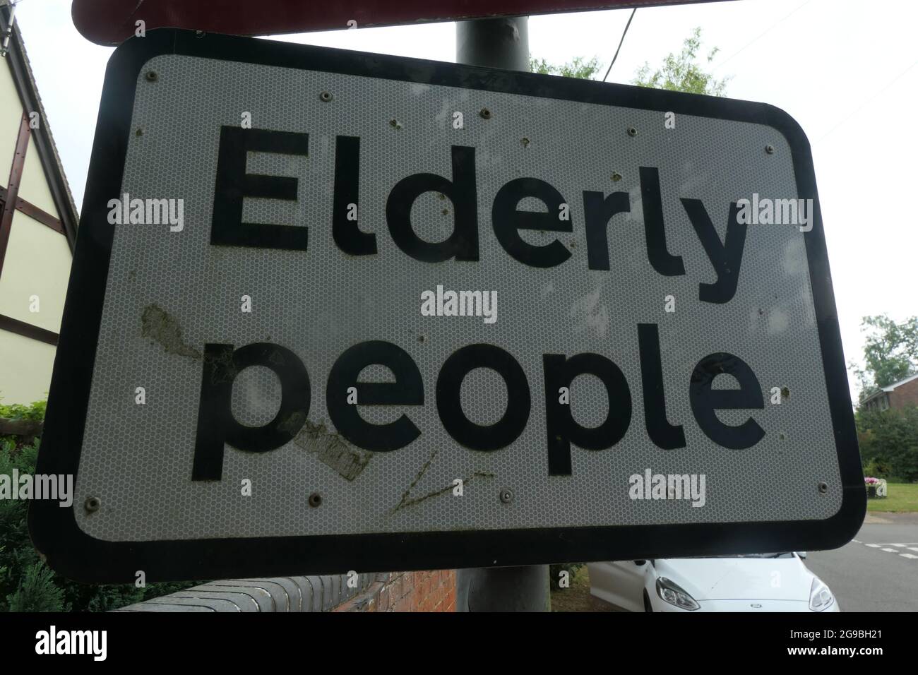 Kilsby village elderly people sign large big outside home peoples old ...