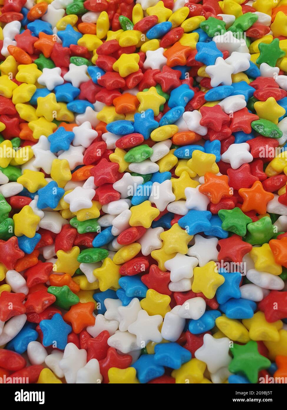 Lots of bright and tasty sweets. The candies are made in the shape of ...