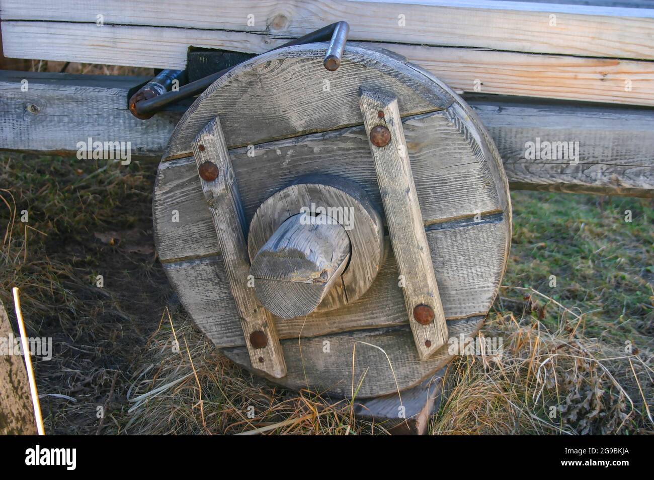Antique antique wheel with an iron lever of a brake from an ancient ...