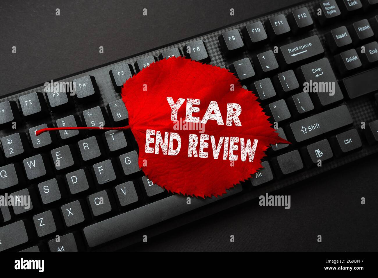 Text caption presenting Year end Review. Concept meaning annual assessment of achievement and ...