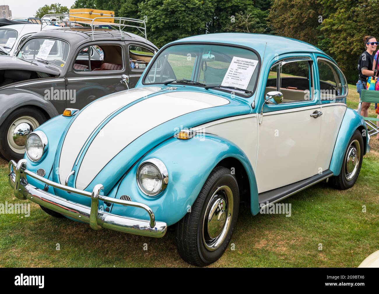 A 1967 VW two toned bug on display at the Pittsburgh Grand Prix and car ...