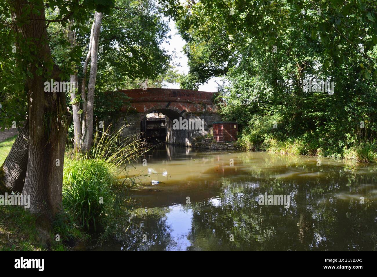 reflection under bridge in river in West Sussex, England Stock Photo ...