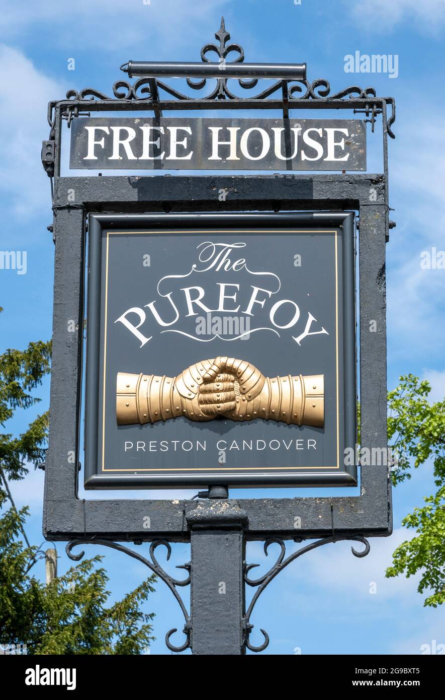 Traditional hanging pub sign at The Purefoy public house, Preston ...