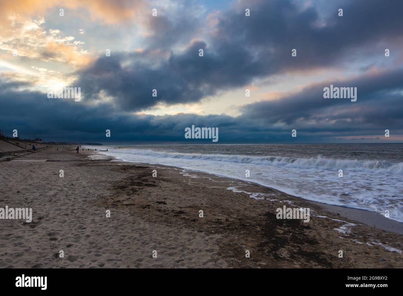 A Beautiful view of cloudy colorful sky over the beach at sunset time ...