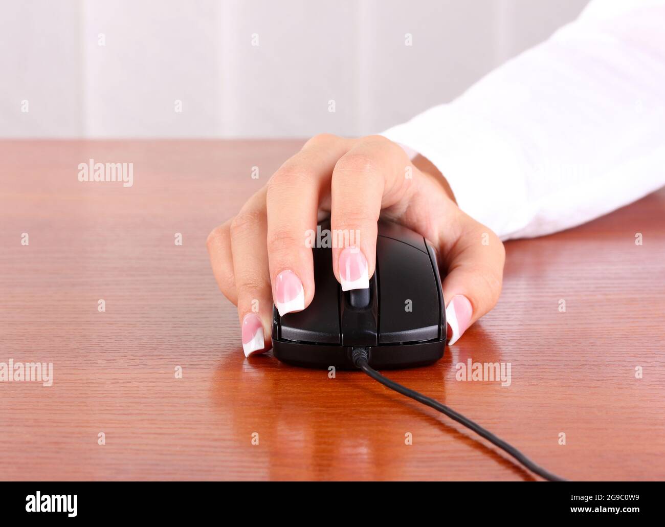 woman's hands pushing keys of pc mouse, close-up Stock Photo - Alamy