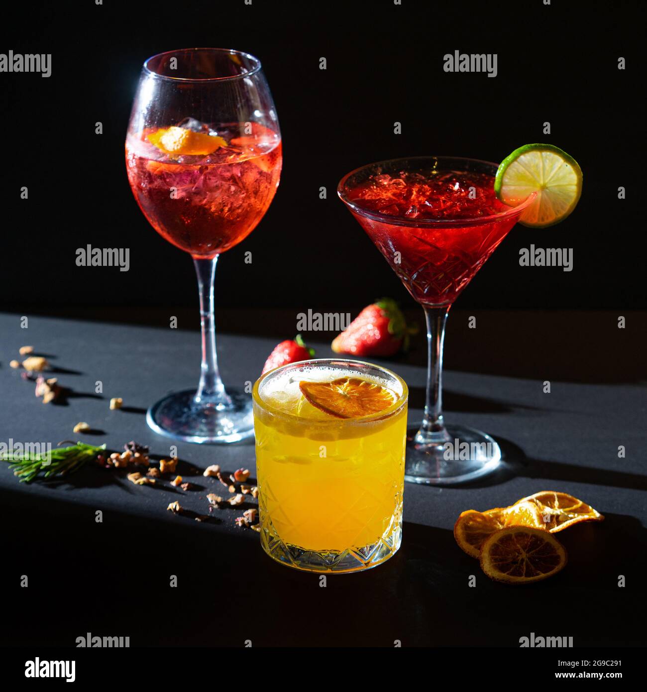 Aperol Spritz and red and yellow aperitif cocktails in glass with ice ...