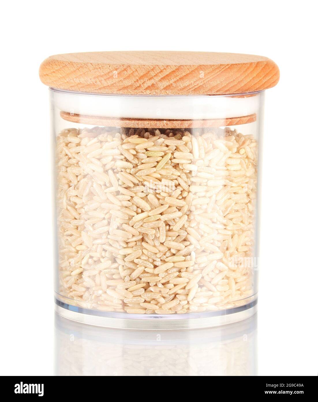 brown rice in jar on white background Stock Photo - Alamy