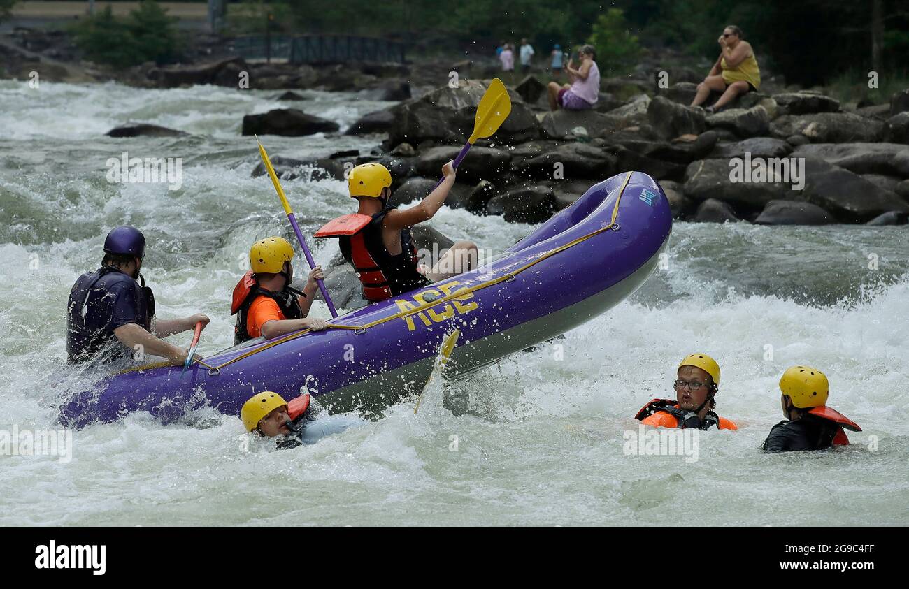 People fall into rapids while Rafting on the Ocoee River in the ...