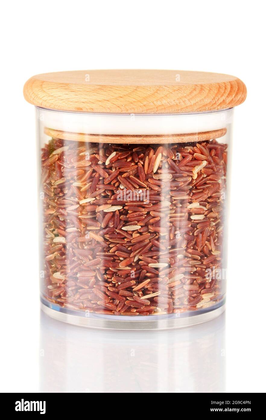 red rice in jar on white background Stock Photo - Alamy