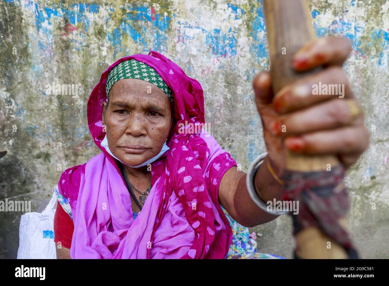 Underprivileged People wait in a queue for coronavirus vaccine ...