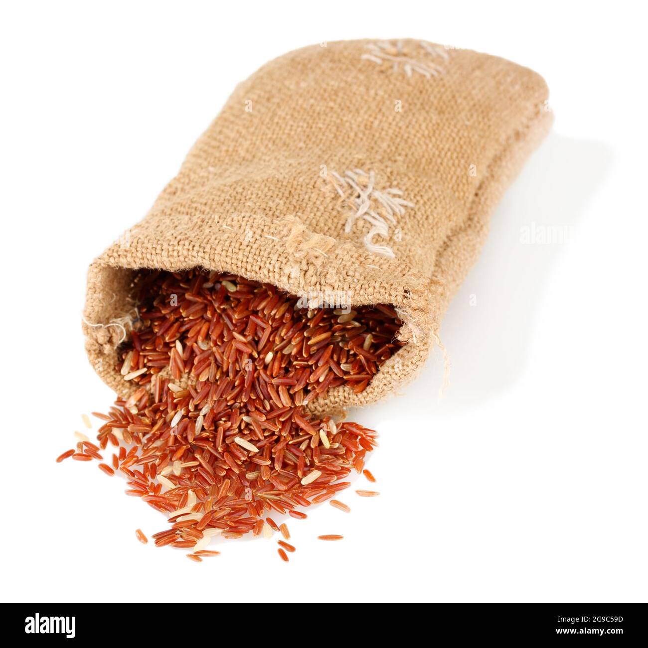 Cloth bag of red rice isolated on white Stock Photo - Alamy