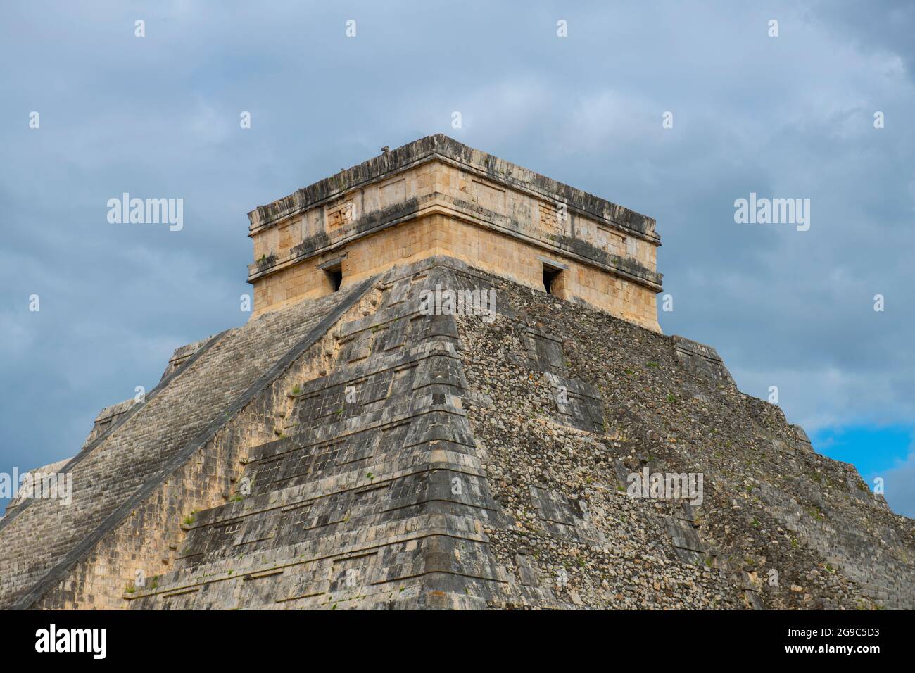Temple of Kukulcan El Castillo at the center of Chichen Itza archaeological site in Yucatan ...