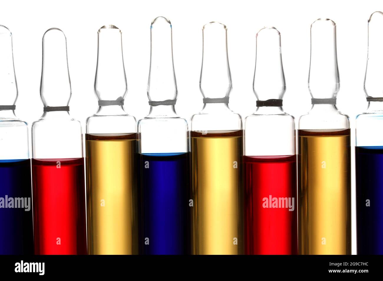 medical ampules with bright liquid, isolated on white Stock Photo - Alamy