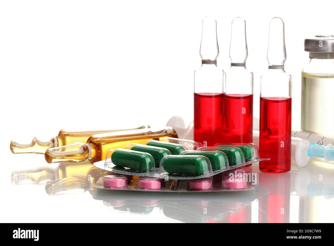 medical ampules, pills and syringes, isolated on white Stock Photo - Alamy
